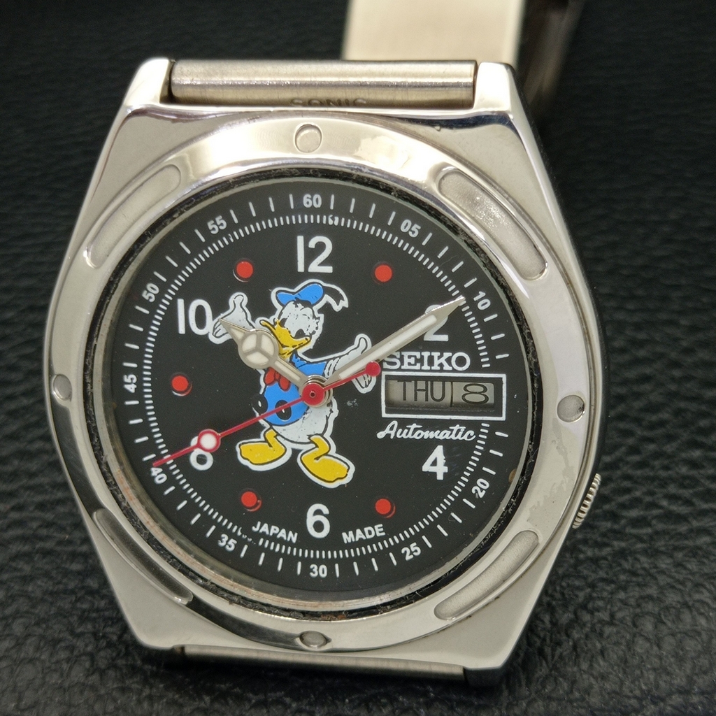 VINTAGE SEIKO AUTOMATIC 7009A JAPAN MENS CARTOON BLACK DIAL WATCH ...